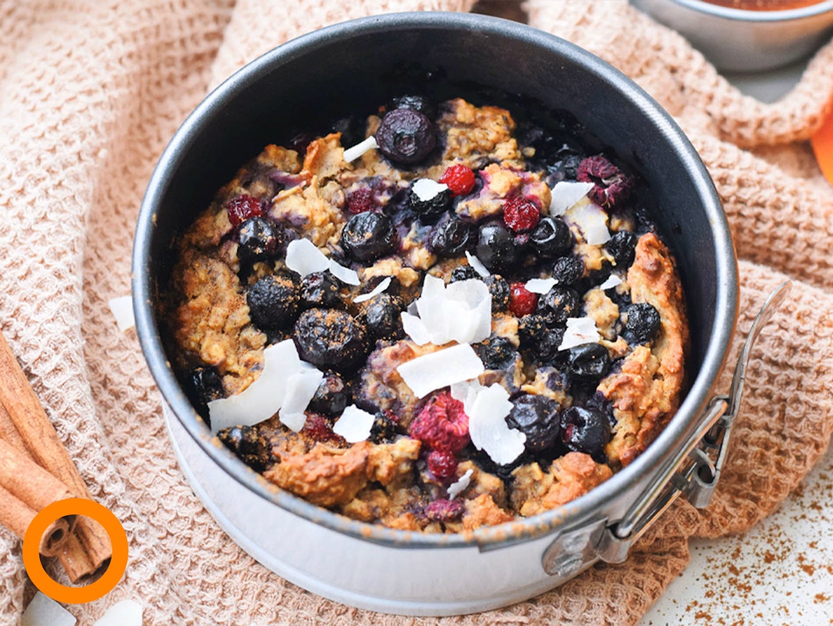 Fried oatmeal with blueberries, nuts, and coconut flakes